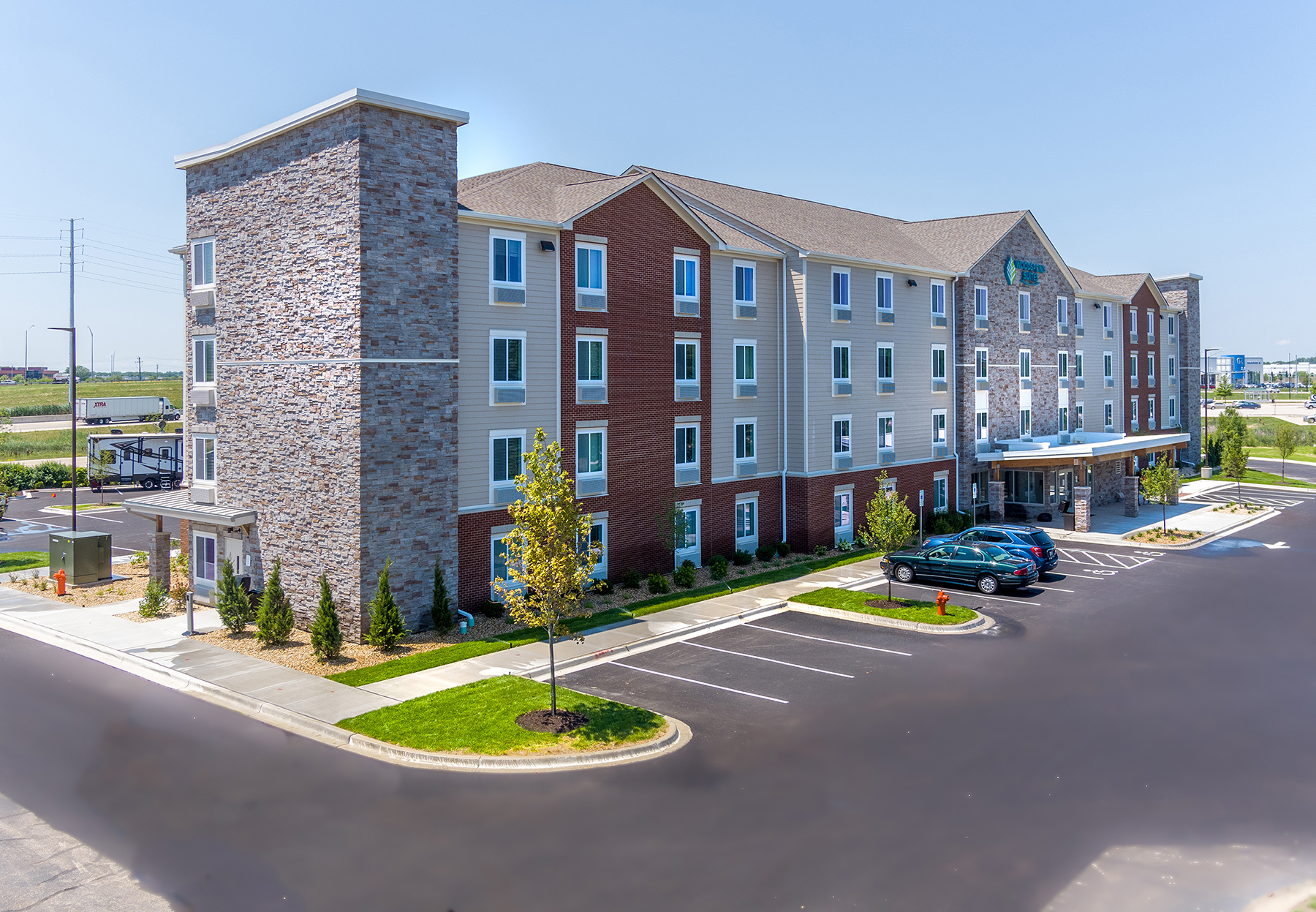 WoodSpring Suites - Elgin, IL | Holladay Properties